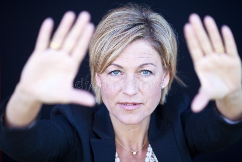 Woman Standing with Her Two Hands Open To Frame Her Head. Shot I Stock ...