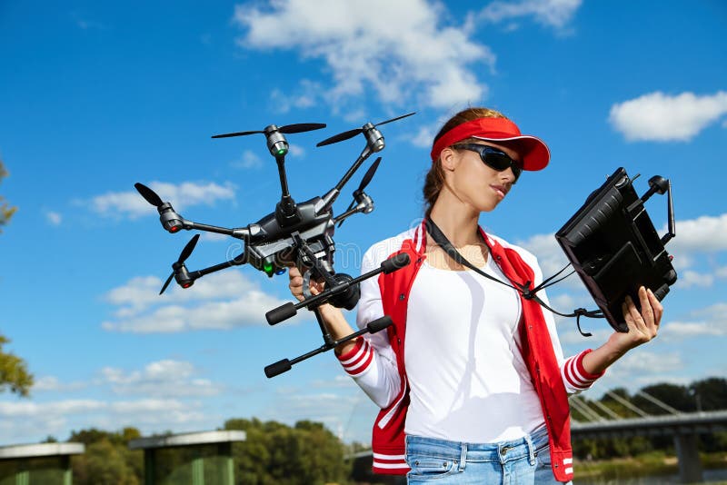 Woman is Standing and Holding Drone Stock Image - Image of leisure ...
