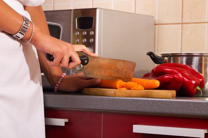 Woman Standing In The Kitchen And Prepare Food Stock Image - Image of ...