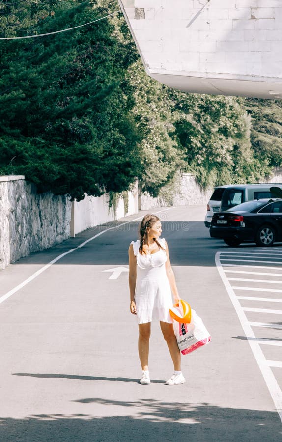 Woman Standing in the Middle of the Road Stock Image - Image of leisure ...