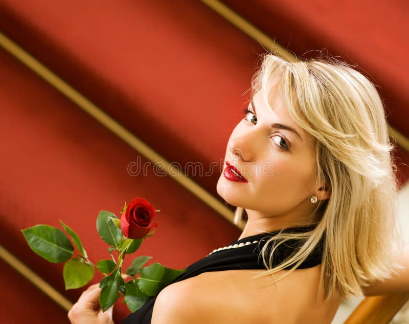 Woman Standing On A Red Carpet Stock Image - Image of holding, leisure ...