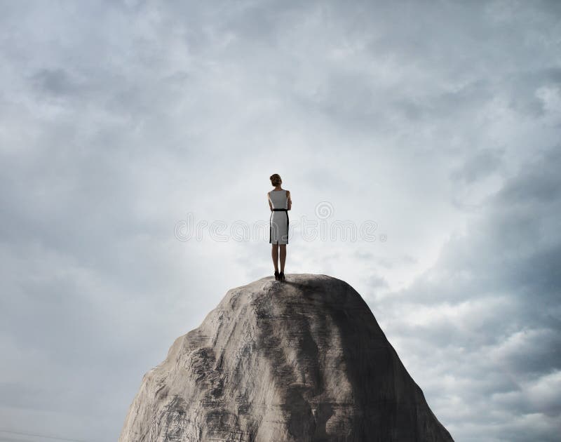Woman standing on rock stock photo. Image of alpine, lady - 33488192