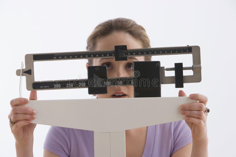 Woman Standing on Scale - Isolated Stock Photo - Image of blond ...