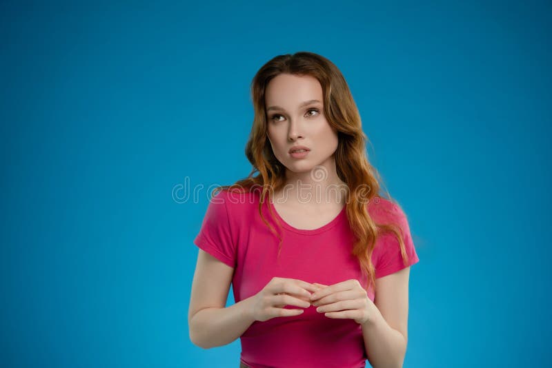 Woman Posing Studio Setting Expressive Emotions Against Vibrant Blue ...