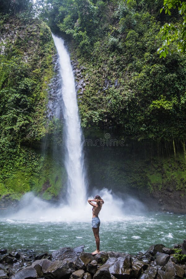 Woman Standing by the Waterfall Stock Photo - Image of calm, adventure ...