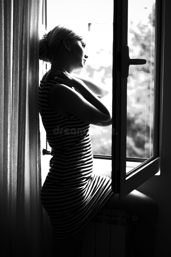 Woman Standing at the Window Stock Image - Image of looks, open: 2715013