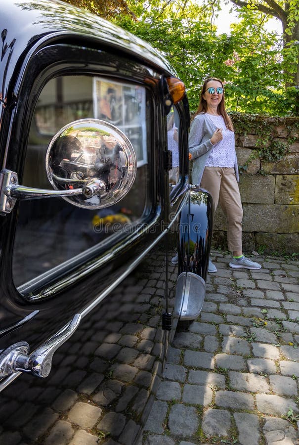 Woman Stands Behind Retro Car Stock Photos - Free & Royalty-Free Stock ...