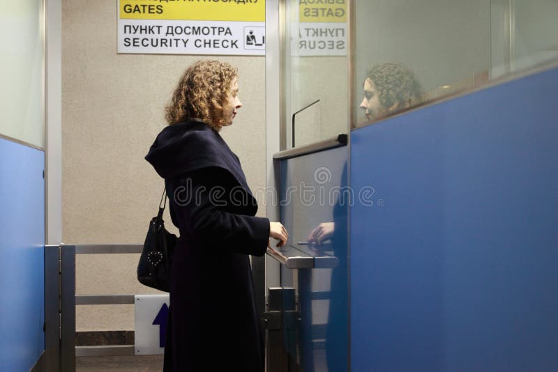 Woman Stands in Security Checkpoint at Airport Stock Photo - Image of ...