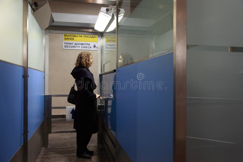 Woman Stands in Security Checkpoint at Airport Stock Photo - Image of ...