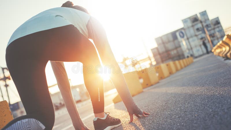 Woman in Start Pose Ready for Sprint. Industrial Workout. Speed Running ...