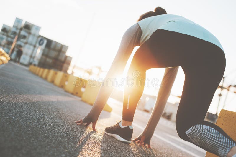 Woman in Start Position Ready for Sprint. Urban Workout. Fast Running ...