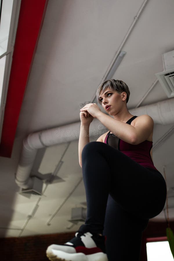 Woman with Step Platform Doing Cross Fit Exercise. Studio Shot Stock ...