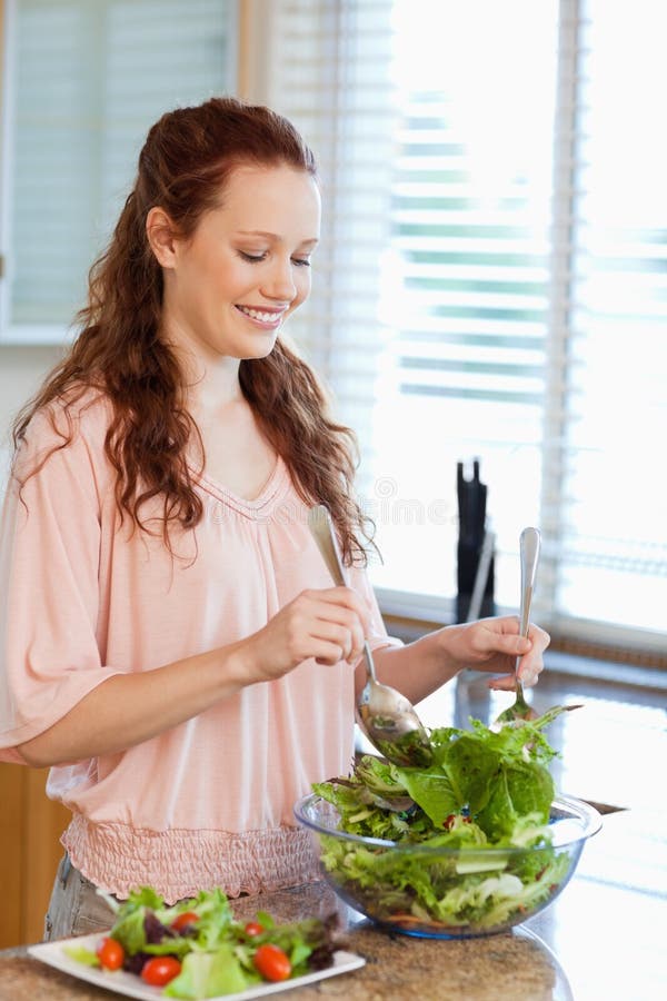 Woman Stirring Bowl of Salad Stock Image - Image of bowl, eating: 22438251