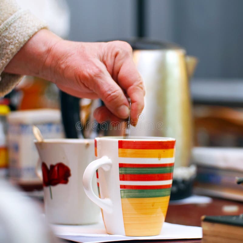 Woman Stirs Sugar with a Teaspoon in a Cup of Tea Stock Image - Image ...