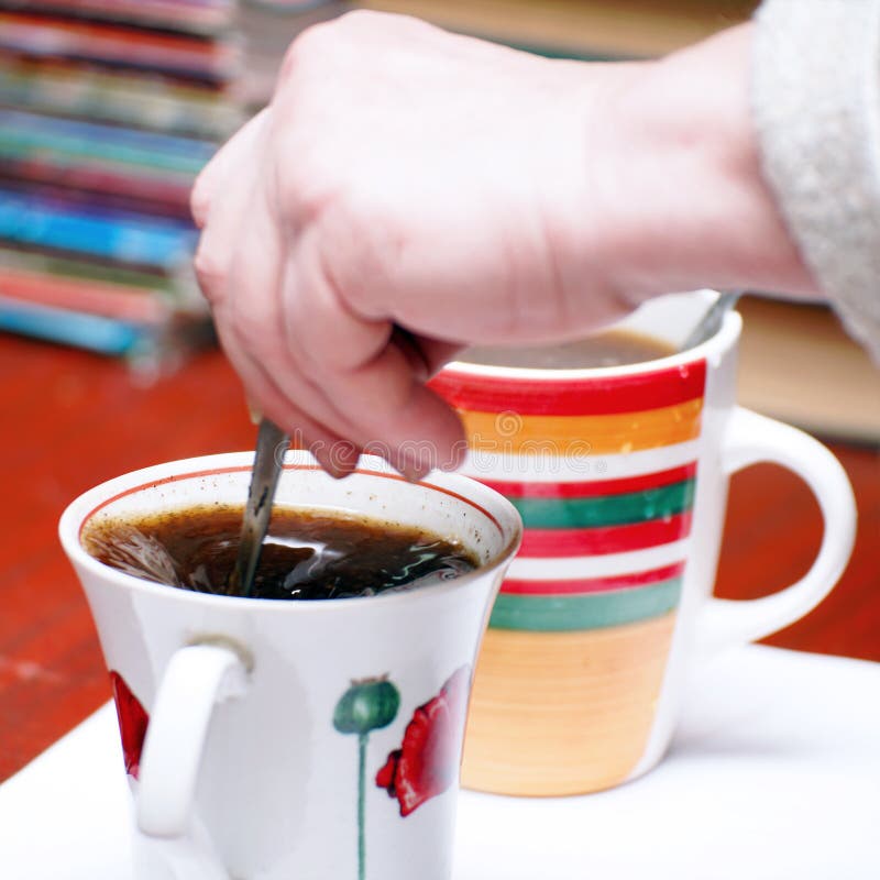 Woman Stirs Sugar with a Teaspoon in a Cup of Tea Stock Photo - Image ...