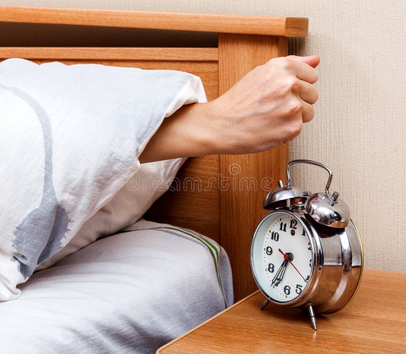 Woman Stopping the Alarm Clock Stock Image - Image of morning, bedtime ...