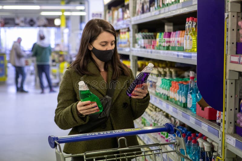 Woman in Store Choosing Stuff Stock Image - Image of corona, list ...