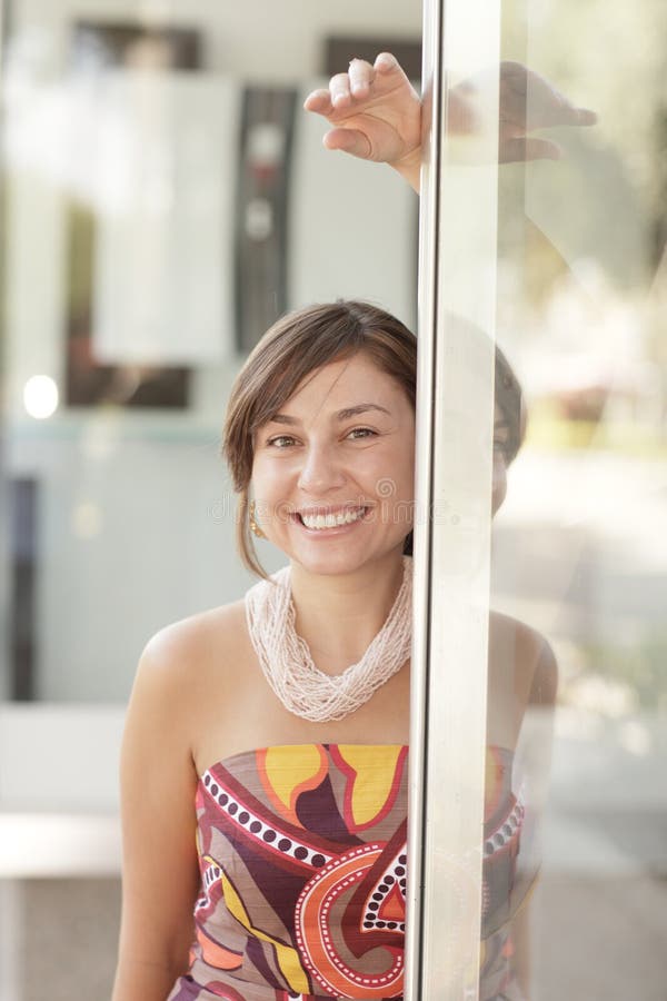 Woman by a store front stock photo. Image of storefront - 17329882
