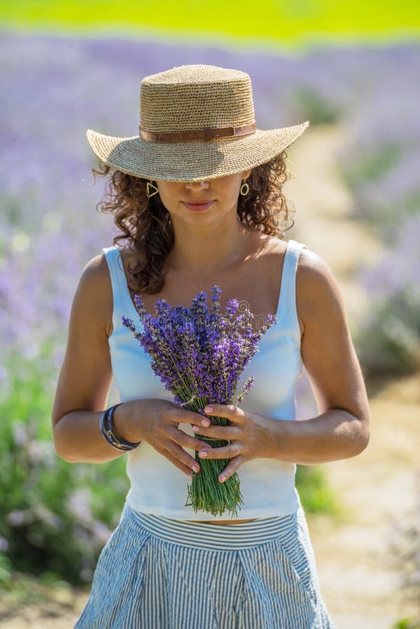 Straw Hat and Bouquet of Yellow Tulips Stock Photo - Image of pink ...