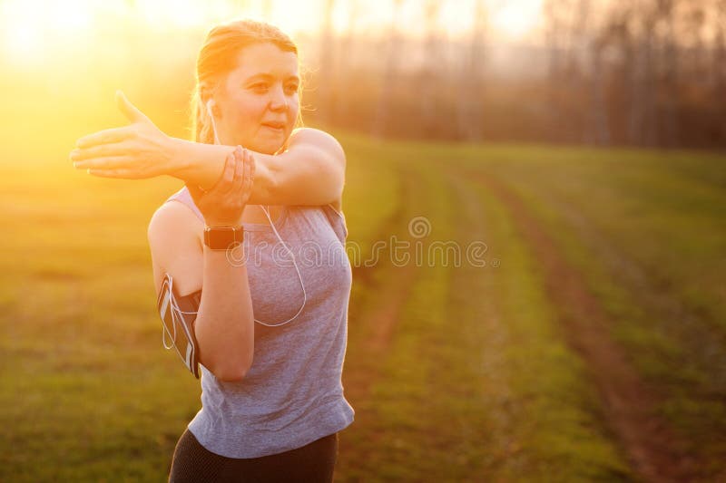 Woman Stretching Arms before Exercise. Stock Image - Image of looking ...