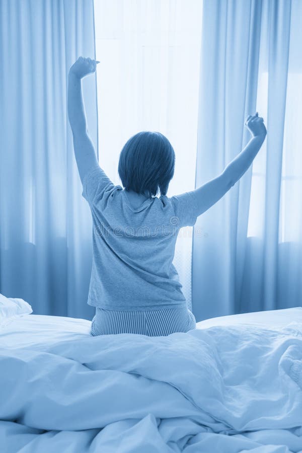 Woman Stretching in Bed after Wake Up, Back View Stock Image - Image of ...