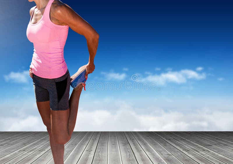 Woman Stretching Leg in Front of Sky Stock Image - Image of female ...