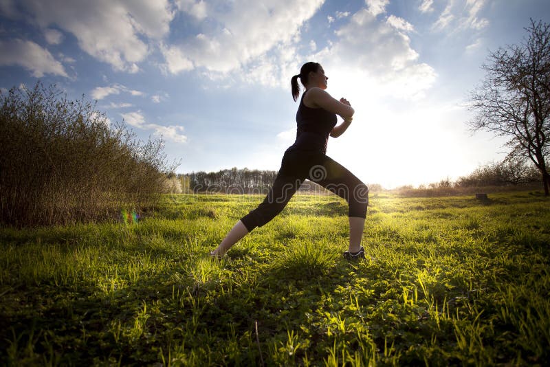 Woman Stretching Out on the Field Stock Image - Image of hiking ...
