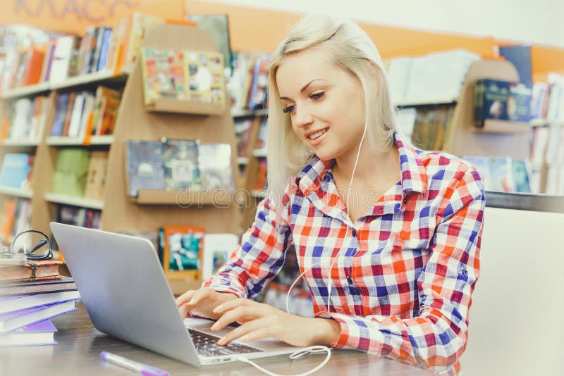 Woman studying in library stock image. Image of modern - 62228923