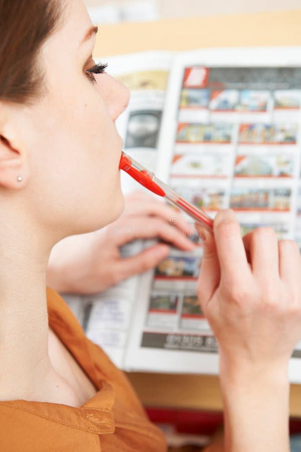 Woman Studying Property Pages of Newspaper Stock Image - Image of home ...