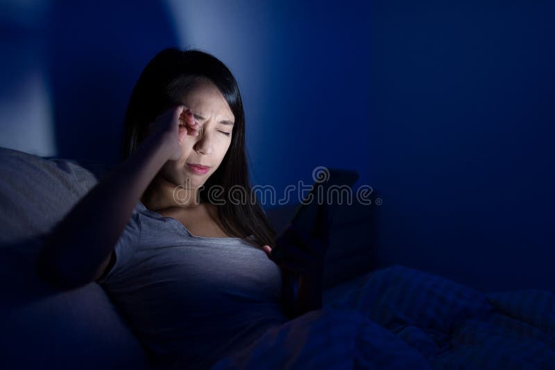 Woman Suffer from Headache with Using Cellphone at Night Stock Image ...