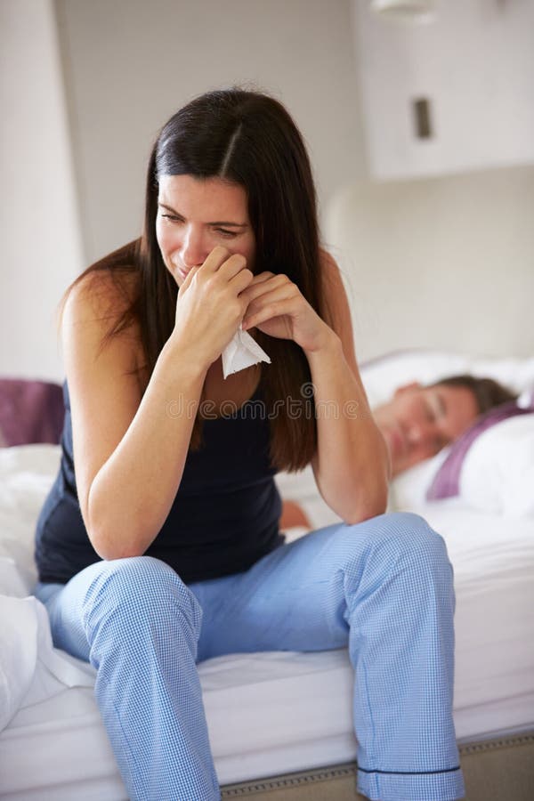Woman Suffering from Depression Sitting on Bed and Crying Stock Image ...