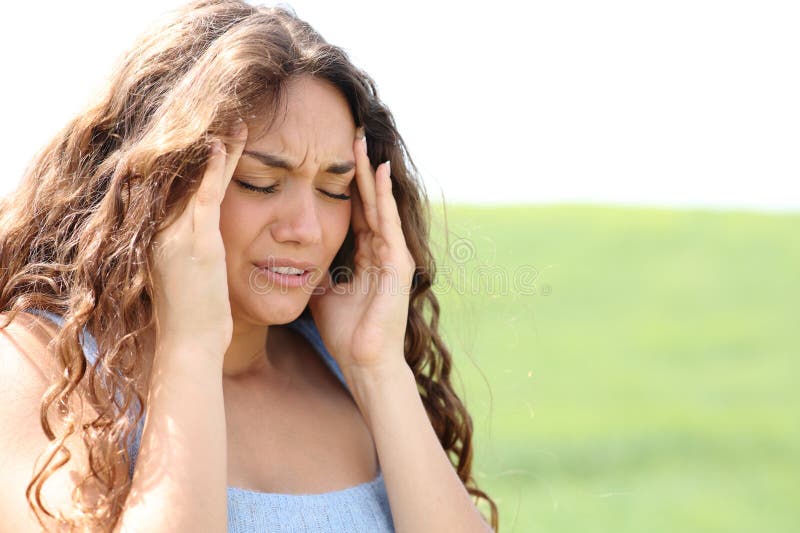 Woman Suffering Head Ache in a Field Stock Image - Image of ecotourism ...