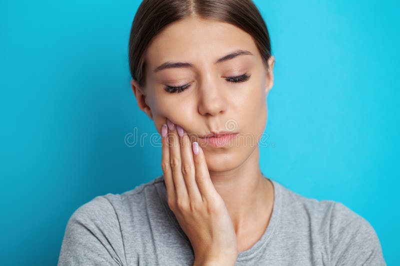 Woman Suffering from Tooth Pain and Touching Cheek Stock Image - Image ...