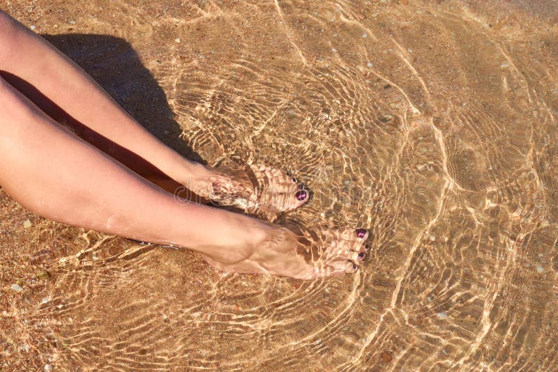 Woman Sunbathing on Sea Beach, Legs View Stock Image - Image of people ...
