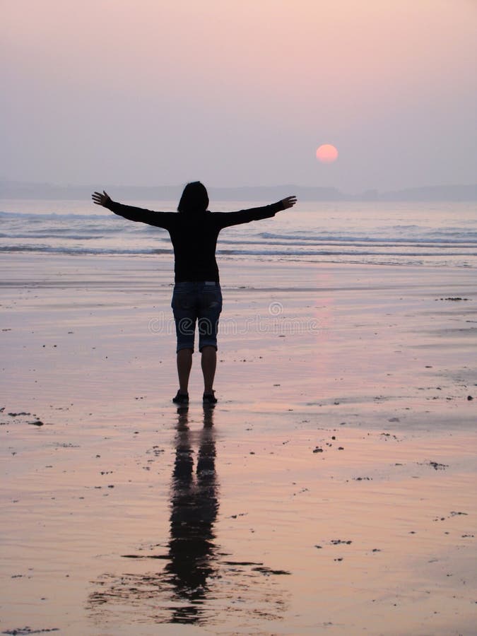 Woman at Sunset stock photo. Image of beauty, water, individual - 6374648