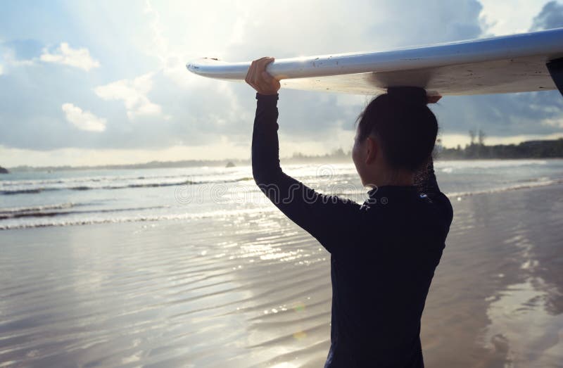 Woman Surfer with Surfboard Ready To Surf Stock Photo - Image of guard ...