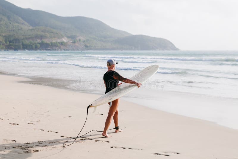 Surfing Woman with Surfing Board Back View Stock Image - Image of ...