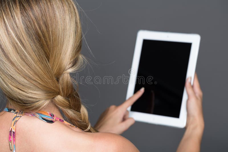 Woman Surfing the Internet on a Tablet Computer Stock Photo - Image of ...