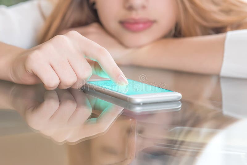 Woman is surfing the net. stock photo. Image of face - 82250176