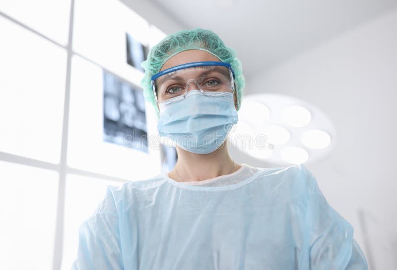Woman Surgeon in Sterile Suit in Operating Room Stock Photo - Image of ...