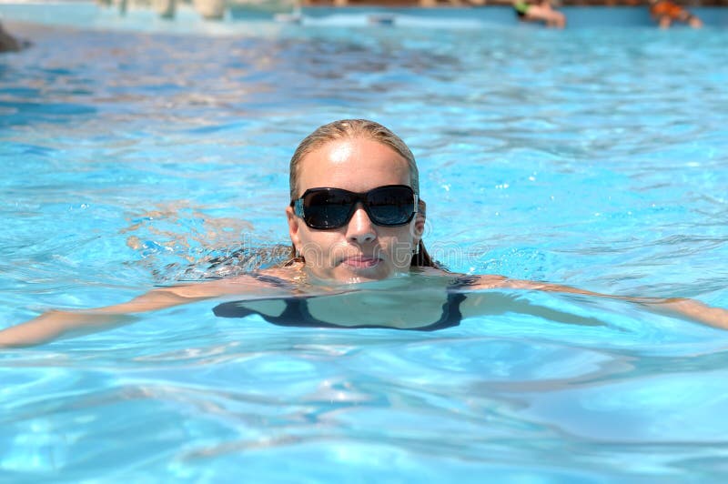 Woman in swimming pool stock photo. Image of exercise - 7143744