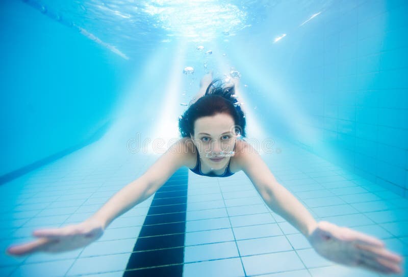 Woman Swimming Underwater in Pool Stock Photo - Image of motion, front ...