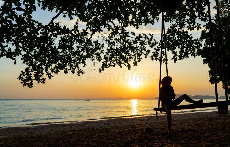 Woman on a Swing at the Beach Stock Image - Image of idyllic, girl ...