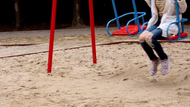 Woman and Man is Swinging on a Swing. the Pair of People in a ...