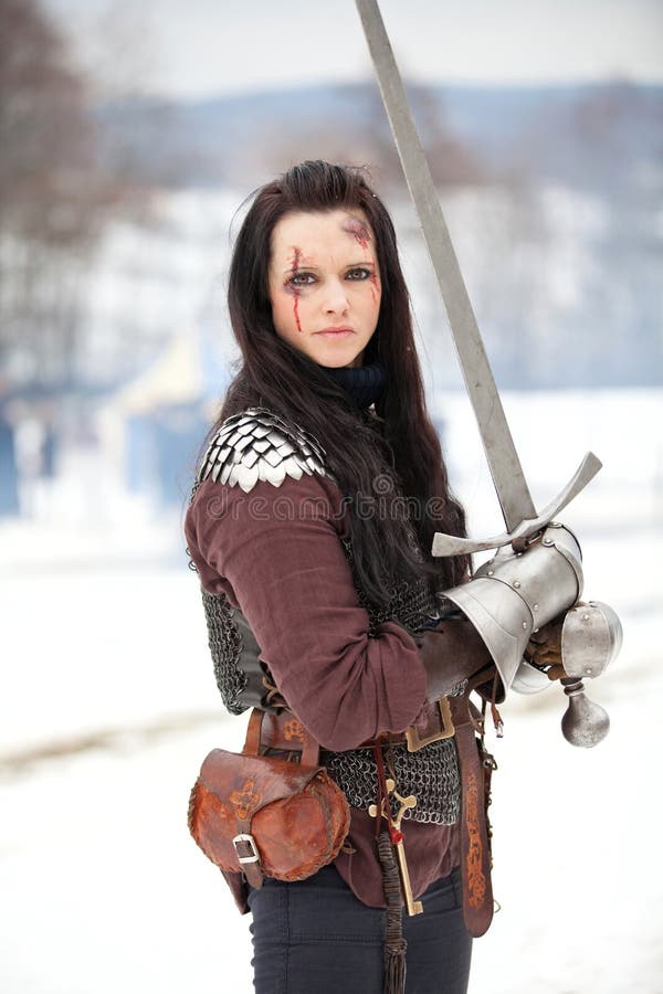 Woman with a sword stock image. Image of brown, long - 29471475