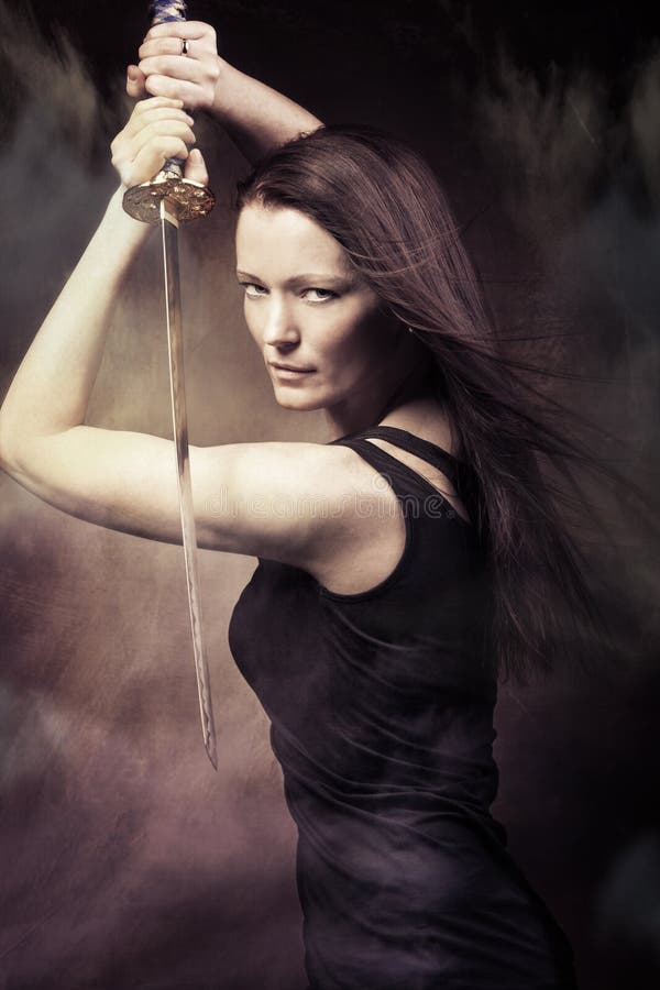 Woman with sword stock image. Image of metal, inside - 13065569