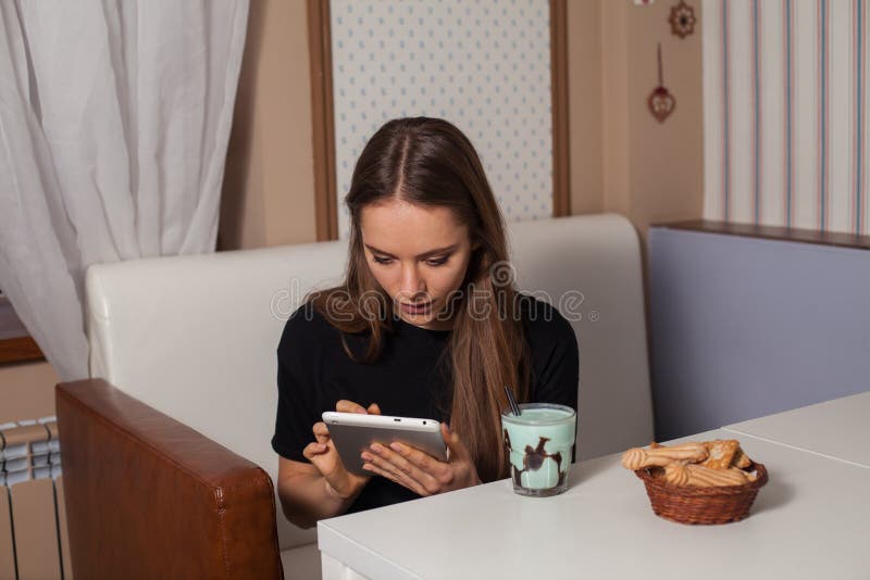 Woman with tablet stock photo. Image of female, indoors - 67747202