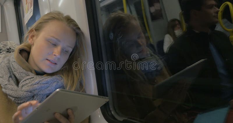 Woman with Tablet Staying in Touch in Metro Train Stock Video - Video ...