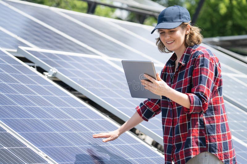 Woman with Tablet Touching Solar Panel Stock Photo - Image of install ...