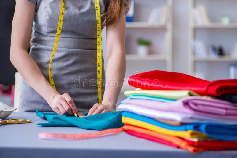 Woman Tailor Working on a Clothing Sewing Stitching Measuring Fa Stock ...